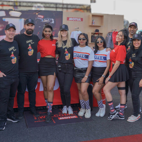 Models showcase the Motul merch at the Shop-in-Shop retail concept ...